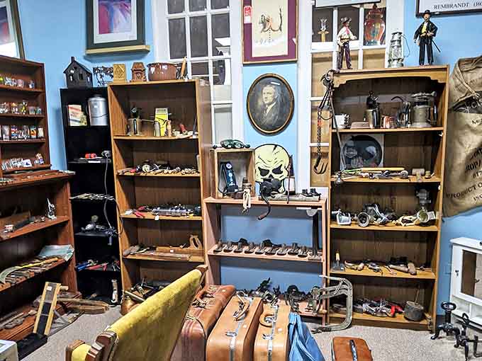 Antiques of yesteryear line these shelves, their handles worn smooth by hands that built America decades ago.