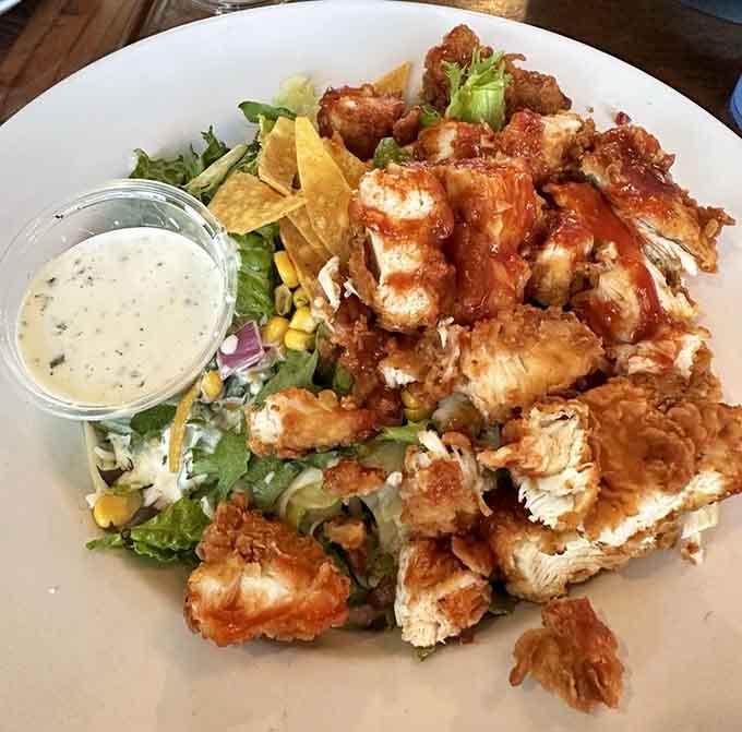 BBQ chicken piled high on fresh greens proves that salads can be exciting when you do them right.