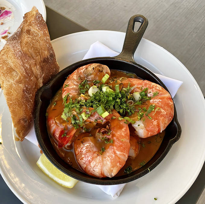 BBQ shrimp, New Orleans-style &ndash; plump beauties bathing in a garlicky, herb-infused butter sauce that you'll want to drink with a straw.