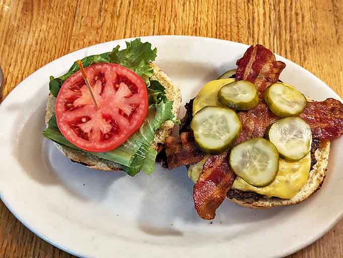 Bacon Burger: The classic American cheeseburger gets the Tommy's treatment with perfectly cooked bacon, melty cheese, and fresh toppings on a toasted bun.