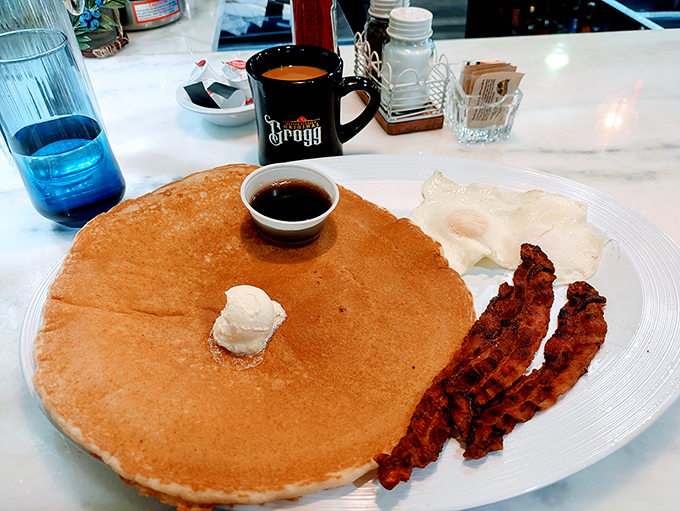 Golden-brown pancake perfection meets crispy bacon &ndash; a breakfast romance that's stood the test of time for good reason.