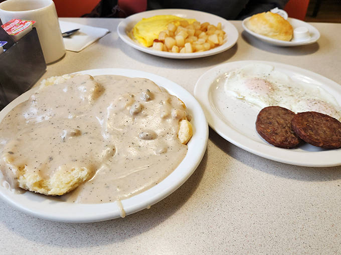 Morning glory on a plate &ndash; creamy biscuits and gravy sharing space with perfectly cooked eggs and sausage patties that mean business.