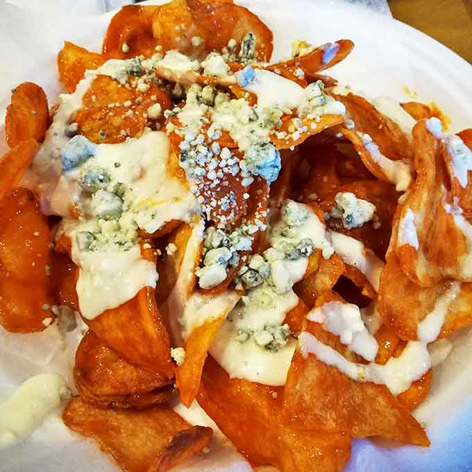 Buffalo chips meet blue cheese in a combination that's messy, indulgent, and absolutely worth the napkin count you'll go through.