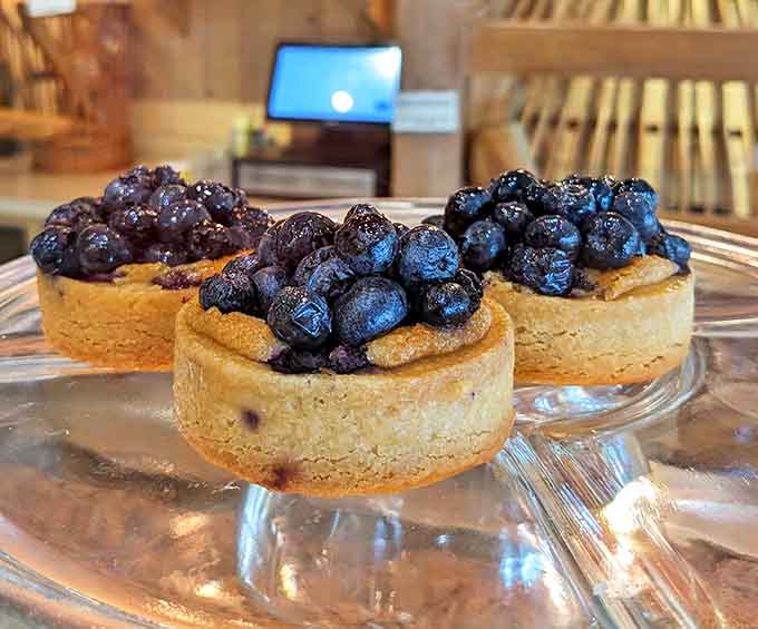 Blueberry Pie: Tiny tarts bursting with Michigan blueberries &ndash; like summer sunshine captured in a buttery crust prison (but the berries aren't complaining).