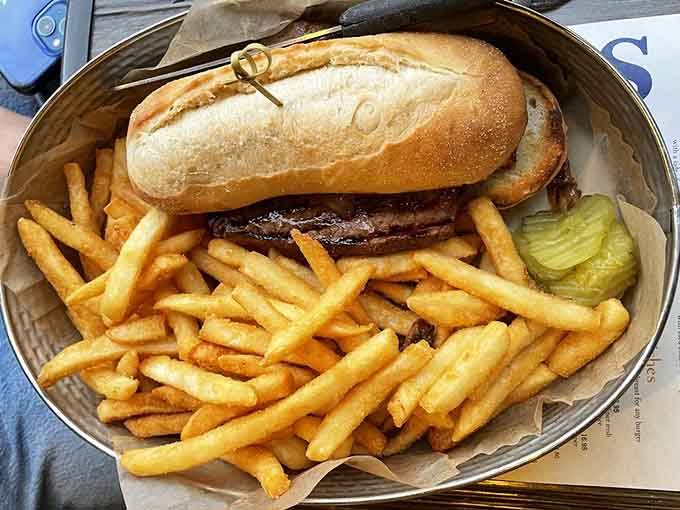 This steak sandwich comes loaded with enough fries to share, though you probably won't want to after that first bite.
