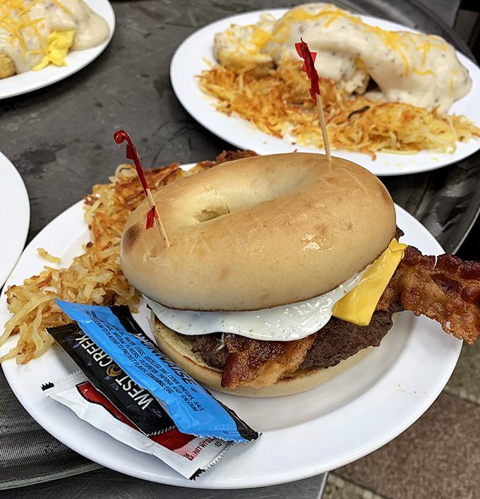 The Vault Burger arrives like a delicious security deposit &ndash; hand-pattied beef on a pretzel bun with all the fixings and golden hash browns.