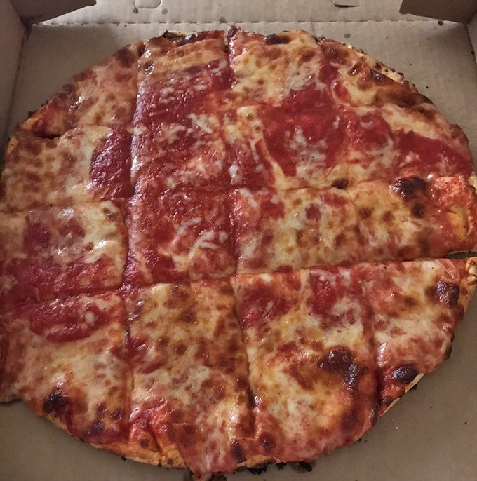 A slice of heaven: the classic cheese pizza cut into squares &ndash; the way all Midwest pizza should be served.