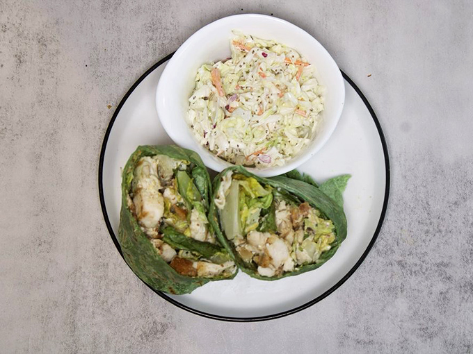 Fresh chicken Caesar wraps prove that healthy options needn't sacrifice flavor &ndash; crisp romaine and tender chicken bundled in a spinach tortilla for guilt-free satisfaction.