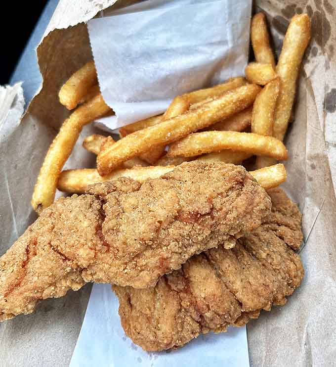 Crispy armor protecting juicy treasure within &ndash; these aren't your average drive-thru strips, they're poultry elevated to art form.