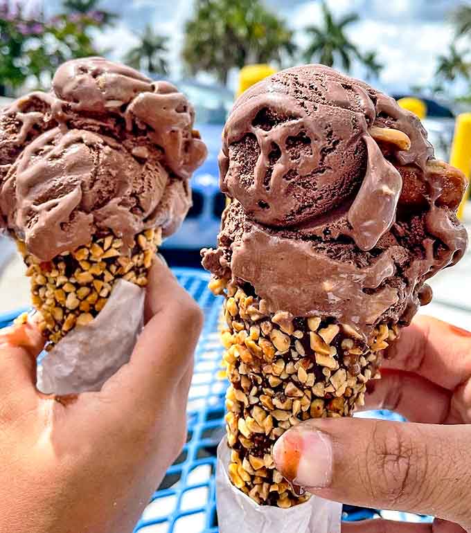 Chocolate scoops nestled in a nut-encrusted cone &ndash; architecture you can eat and a masterpiece that won't last long in Florida's sunshine.