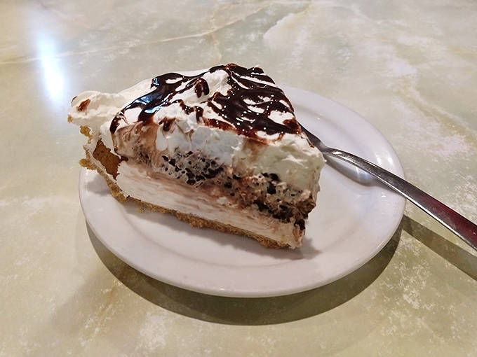 The legendary chocolate sour cream pie – where velvety chocolate meets tangy sour cream in a dance that's been making locals swoon for decades.