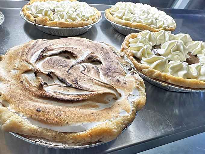 Chocolate cream pies with perfectly toasted meringue peaks that would make even your grandmother secretly jealous of their height.