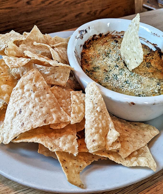 This crab dip, surrounded by a congregation of crispy tortilla chips, disappears faster than you can say "pass the appetizer."