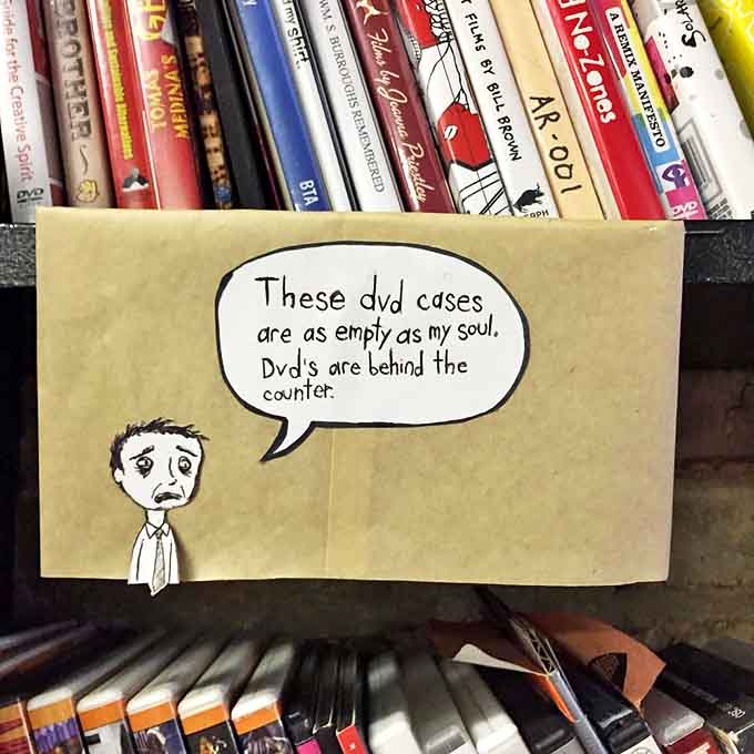 This clever shelf note perfectly captures the store's quirky humor &ndash; those empty DVD cases indeed house nothing but broken dreams and dust.