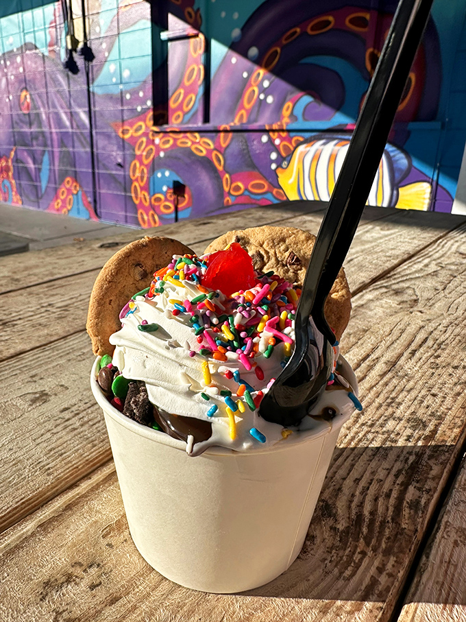 The Cookie Monster sundae lives up to its name &ndash; vanilla soft serve buried under an avalanche of cookie chunks, chocolate sauce, and rainbow sprinkles.