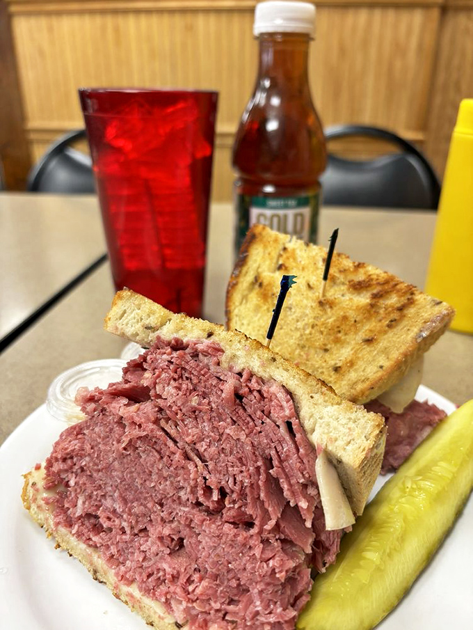 A classic corned beef sandwich with a pickle spear standing guard &ndash; the lunch that launched a thousand Cleveland food pilgrimages.