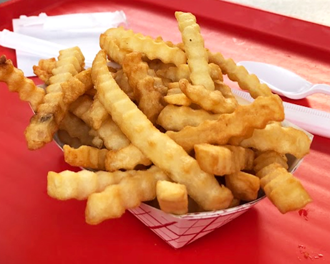 Golden, crispy crinkle-cut fries – the perfect sidekick to any sandwich and worthy of their own fan club.