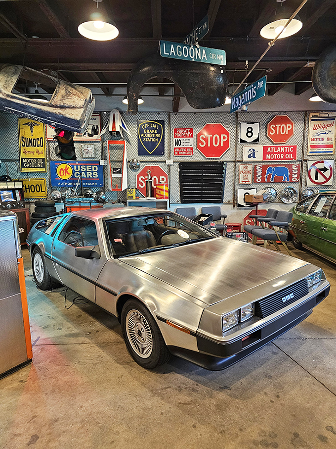 Great Scott! A stainless steel DeLorean waits patiently among vintage road signs, ready for your next time-traveling adventure at 88mph.