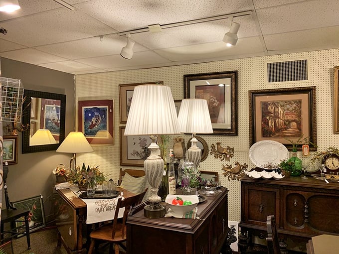 Lamps cast warm glows over wooden furniture pieces that have witnessed decades of family gatherings, arguments, reconciliations, and everyday moments now forgotten.