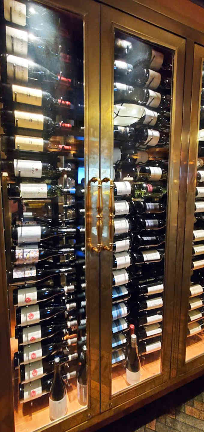 Wine enthusiasts rejoice! The cellar houses an impressive collection that would make even the most discerning oenophile weak at the knees.