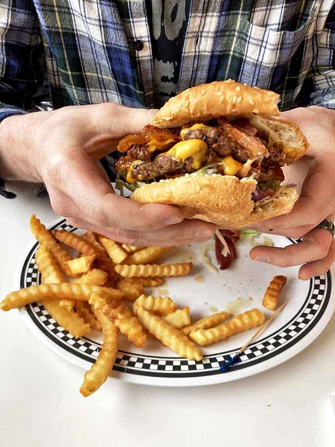 Double Cheeseburger deluxe: This isn't just a burger &ndash; it's a handheld masterpiece of beef, cheese, and toppings that demands to be photographed before devoured.