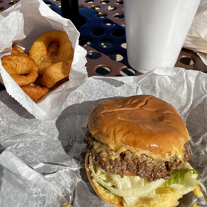 A burger and onion rings that would make fast food mascots weep with jealousy &ndash; real food for real appetites.