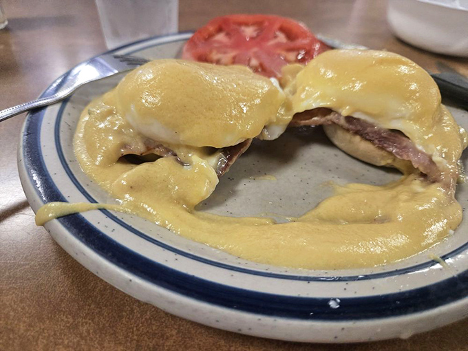 Eggs Benedict done right &ndash; perfectly poached eggs nestled on Canadian bacon and draped in house-made hollandaise that's worth getting out of bed for.