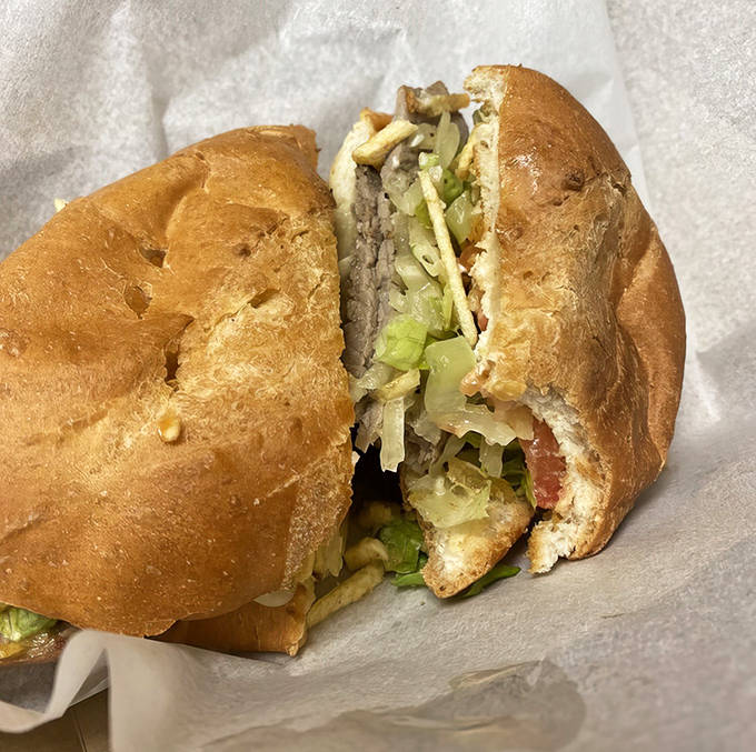 The heavyweight champion of sandwiches &ndash; crispy, gooey, meaty, and tangy &ndash; a perfect harmony pressed between bread.