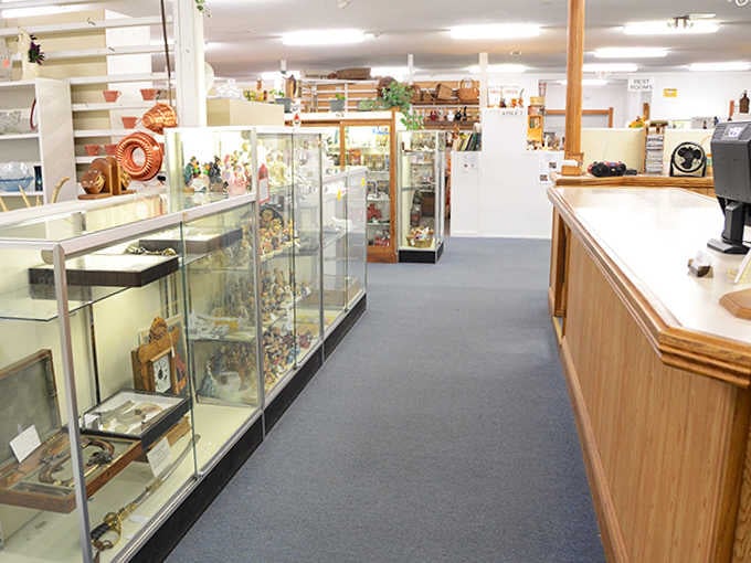 Polished display cases house carefully arranged collectibles, creating museum-quality exhibits where everything has a price tag.