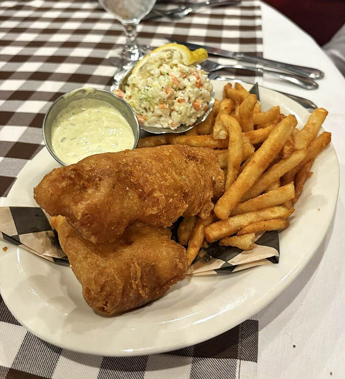 Golden-battered fish and chips that crackle with each bite, served with a coleslaw that somehow makes cabbage seem exciting.