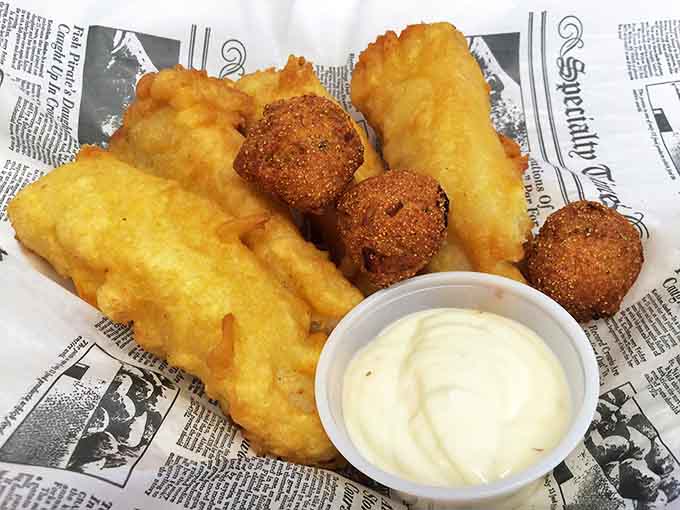 The fish basket that makes landlocked Midwesterners forget they're hundreds of miles from any ocean. Golden, crispy, and served with enough fries to share (but you won't).