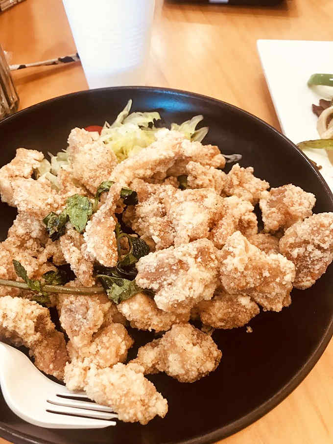 Popcorn chicken with fresh basil brings Sichuanese inspiration to Tampa &ndash; crispy, aromatic bites that disappear faster than Florida sunshine after a storm.