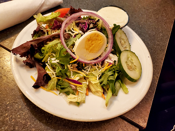 Garden Salad: Even the humble salad gets star treatment here&mdash;crisp, colorful, and arranged with the care usually reserved for more expensive menu items.