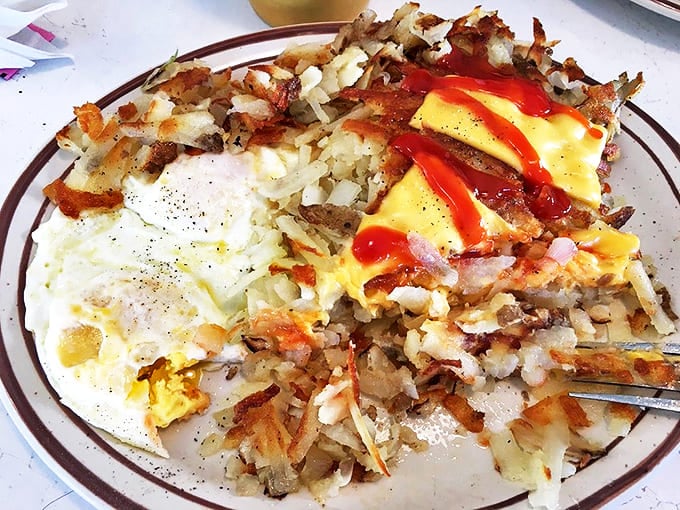 Hash browns so perfectly executed they deserve their own fan club – crispy edges giving way to tender centers.