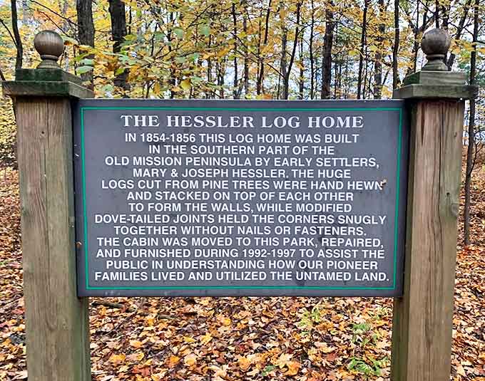 Pioneer ingenuity on display - massive pine logs joined without a single nail, showcasing craftsmanship that's survived over 165 years.