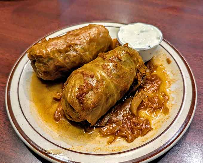 Hungarian cabbage rolls at a barbecue joint, proving that the best restaurants color outside the lines deliciously.