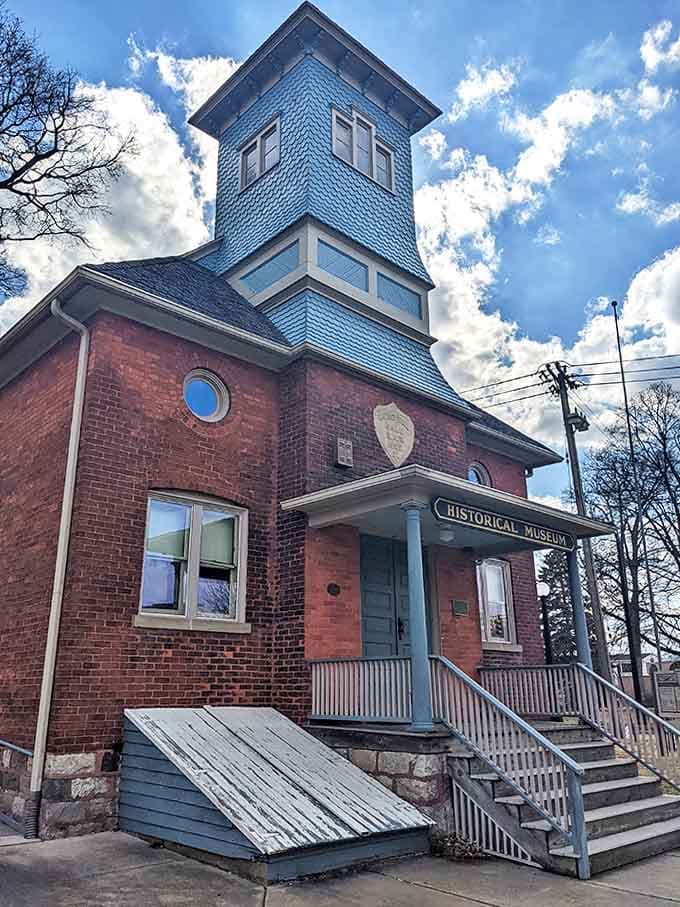 Marshall's Historical Museum wears its distinctive blue tower like a crown, preserving local stories inside brick walls that have witnessed generations pass by.
