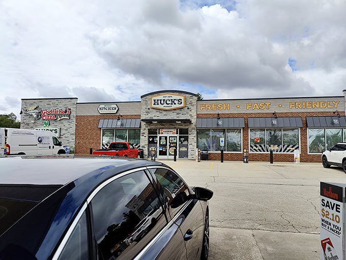 Huck's convenience store stands ready for road trippers and locals alike, offering everything from coffee to fishing bait with equal importance.