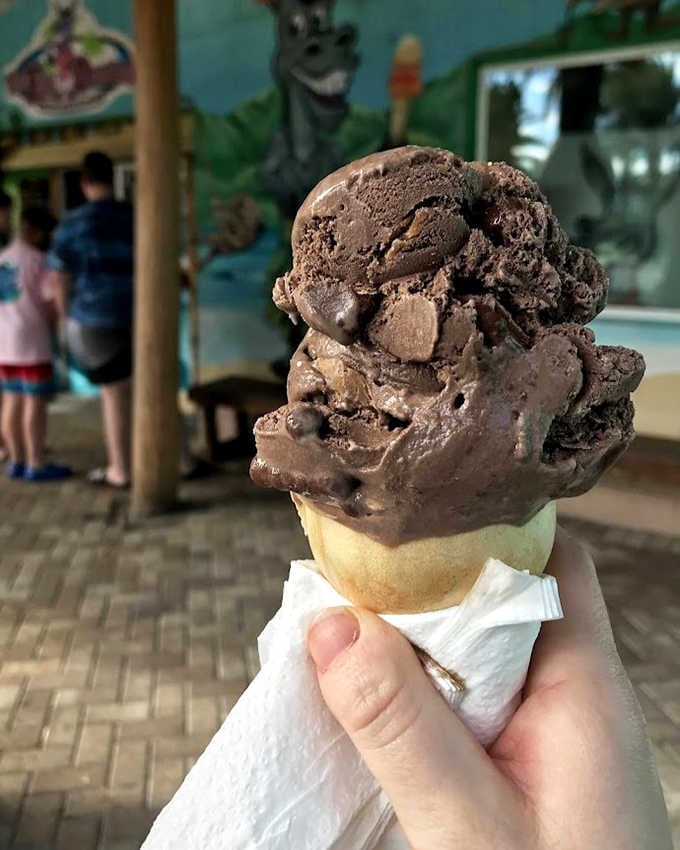 Chocolate decadence piled high on a waffle cone &ndash; the kind of serious scooping that requires focus, commitment, and possibly a backup napkin strategy.