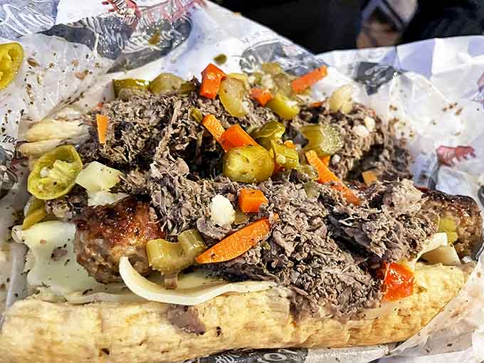 Italian beef piled high with peppers and au jus, proving that sometimes more really is more, especially with sandwiches.