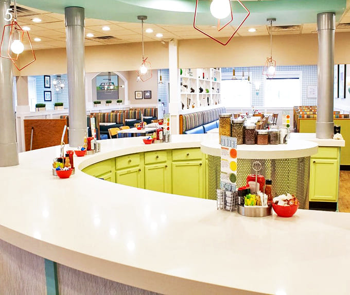 The lime-green juice bar stands ready to quench thirsts and boost vitamins – morning fuel station for the health-conscious crowd.