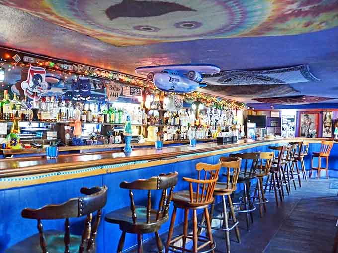 Belly up to this blue beauty where craft beers flow and conversations last until closing time.