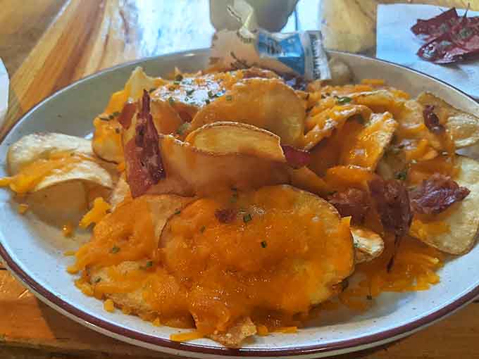 Loggers Potato Skins loaded with melted cheese and bacon &ndash; because in the northwoods, calories don't count and sharing is optional.