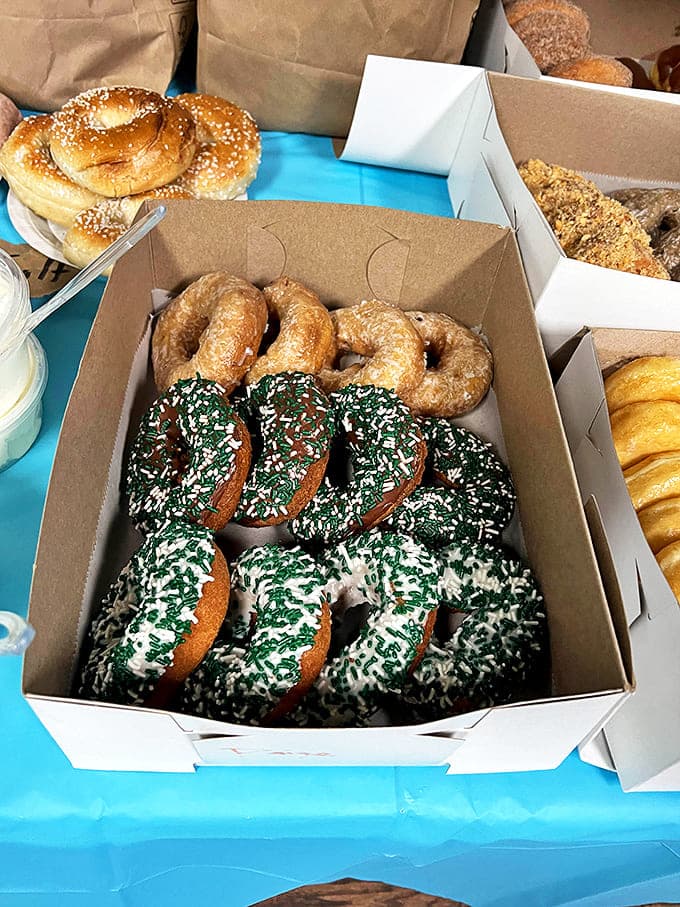 A box of donuts with festive sprinkles – proof that vegetables aren't the only food group that benefits from adding a little color.