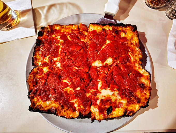 That perfect caramelization where cheese meets crust creates a flavor that makes pizza scientists weep with joy.