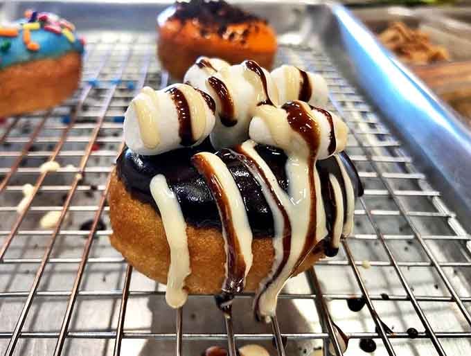 Campfire nostalgia in donut form – chocolate, marshmallow, and graham cracker crumbs without the mosquito bites.