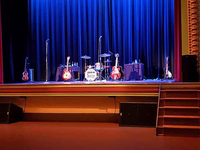 The stage stands ready for the next performance, with instruments awaiting musicians who'll soon fill the historic space with sound.