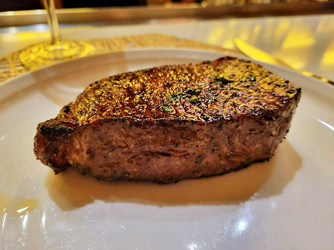 The NY Strip arrives with the confidence of a Broadway star &ndash; perfectly seared, ready for its close-up, and absolutely commanding the spotlight.