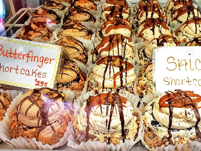 These shortcakes aren't just desserts, they're architectural wonders topped with cream swirls and chocolate drizzles that defy gravity.