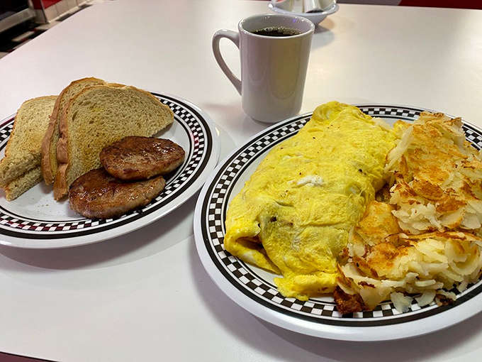 Fluffy omelets paired with perfectly crisped hash browns and sausage patties &ndash; breakfast doesn't get more honest or satisfying than this.